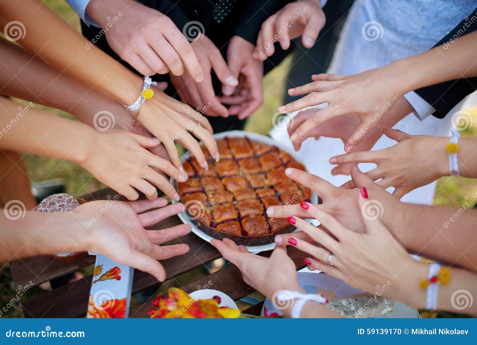 Hands reach for the cake stock photo. Image of diner - 59139170