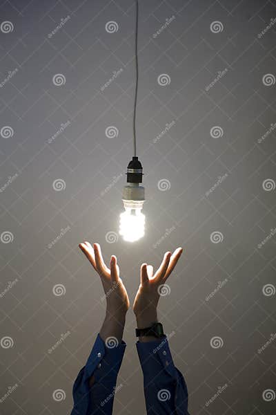 Hands Reaching for Light Bulb Stock Image - Image of bulb, light: 5112783