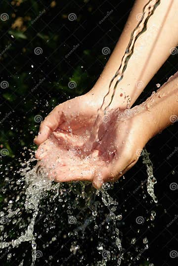The Hands Receiving the Water Stock Image - Image of feel, mineral: 2706647