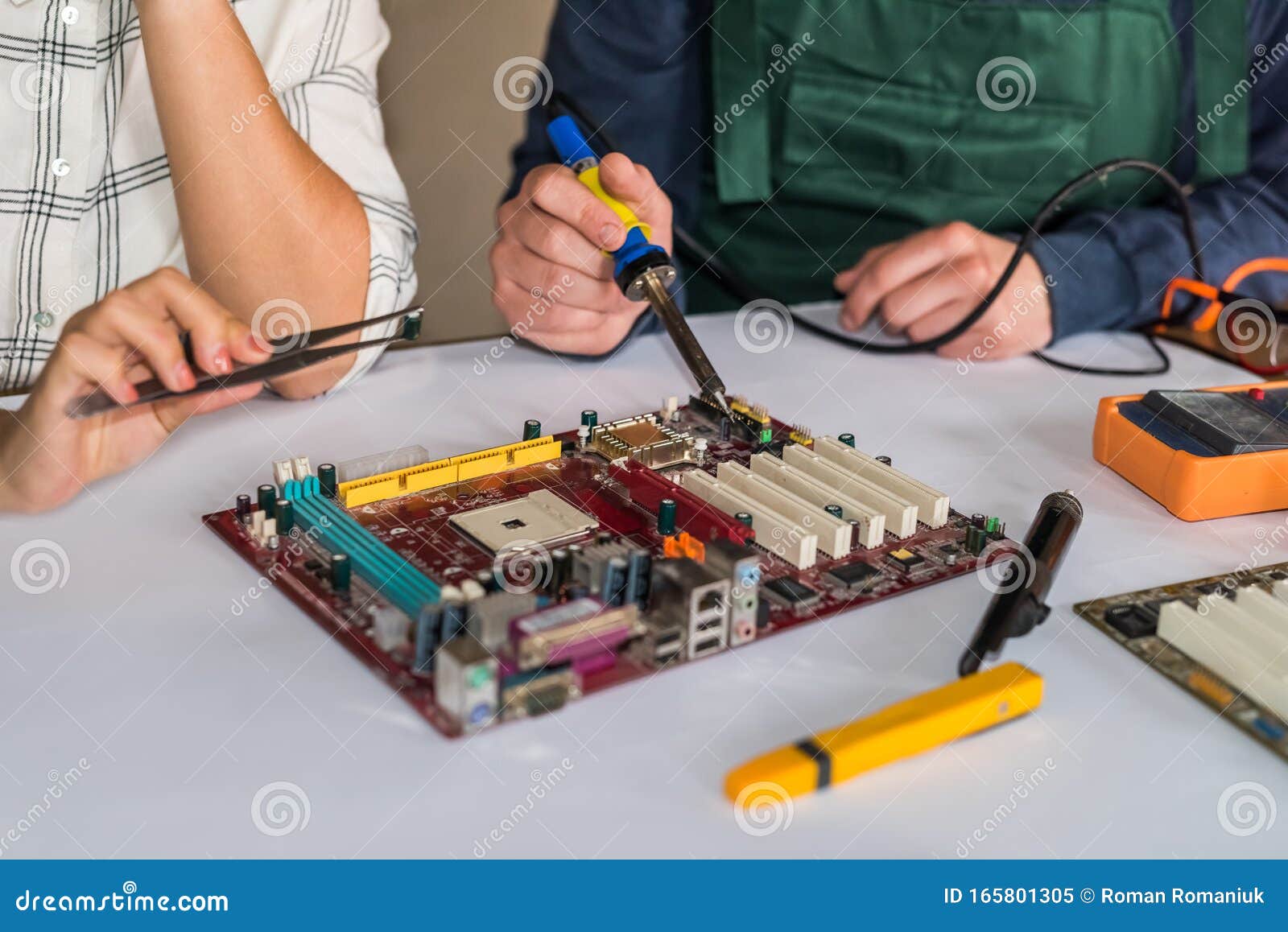 Hands Repairing Computer Motherboard by Soldering Close Up Stock Image ...
