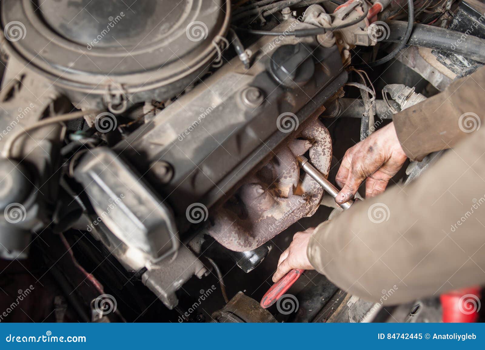 Hands of Repairman Mechanic Working on Engine Using Tool Stock Image ...