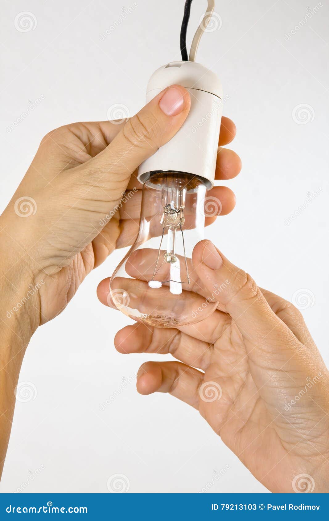 Hands Replacing Incandescent Light Bulb Stock Image - Image of ...