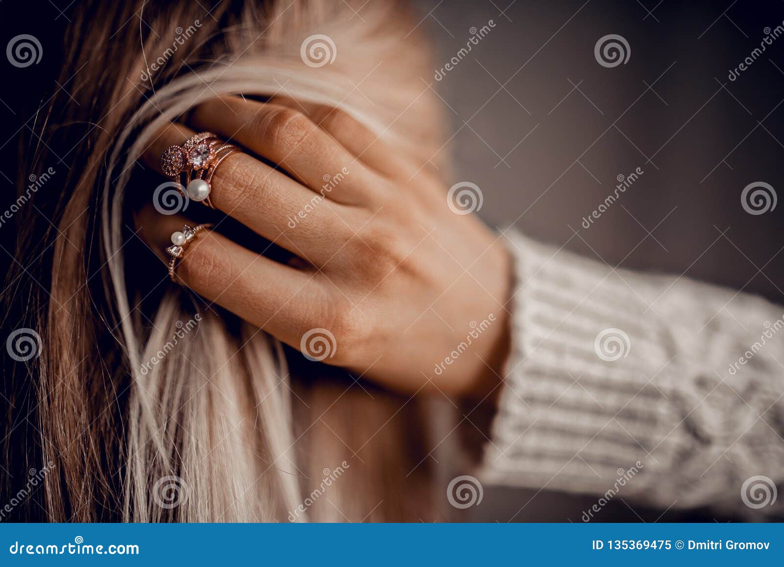 Hands with beautiful rings stock image. Image of hand - 135369475