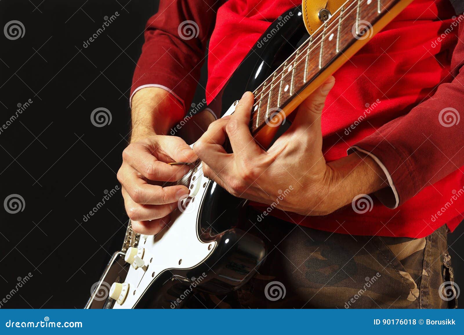 Hands of Rock Musician Playing the Electric Guitar on Black Background ...