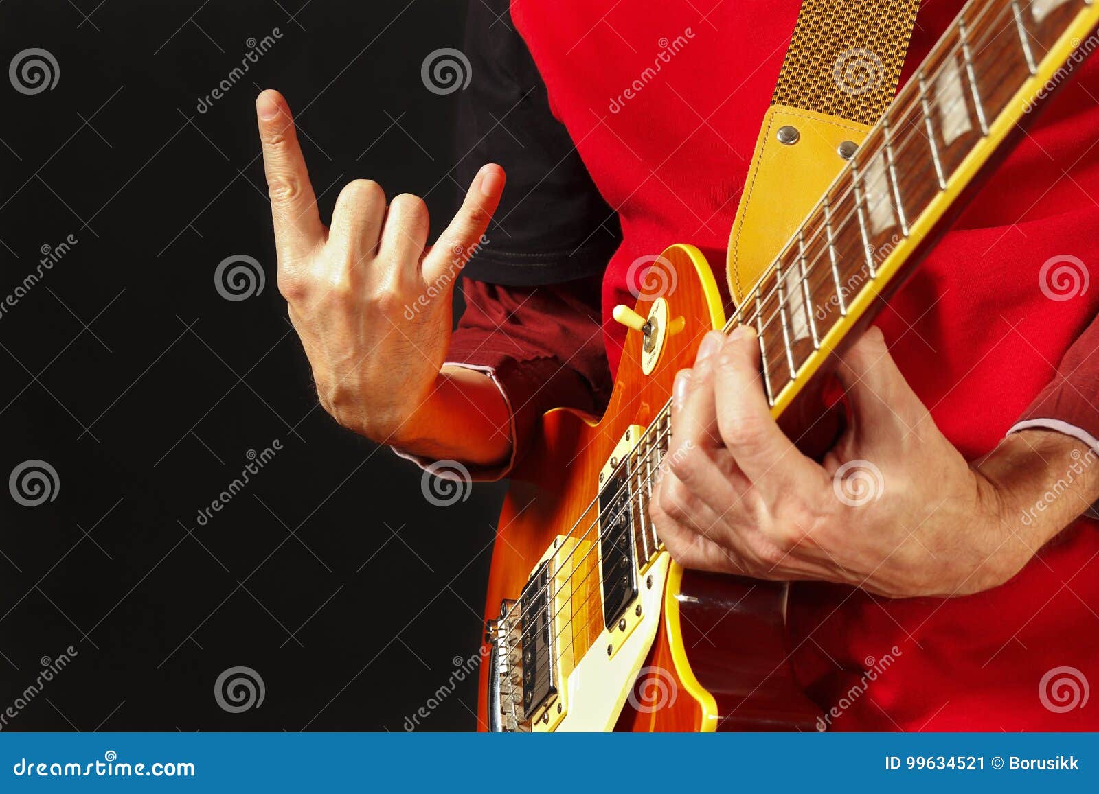 Hands of Rock Musician Playing the Guitar on Dark Background Stock ...