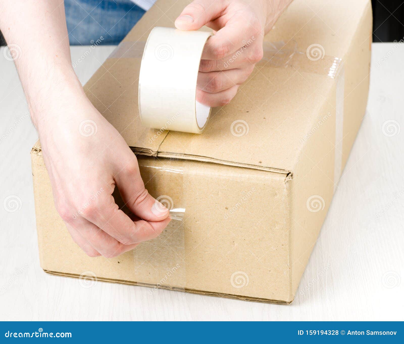 Hands with Roll Adhesive Tape Stock Photo - Image of pack, glue: 159194328