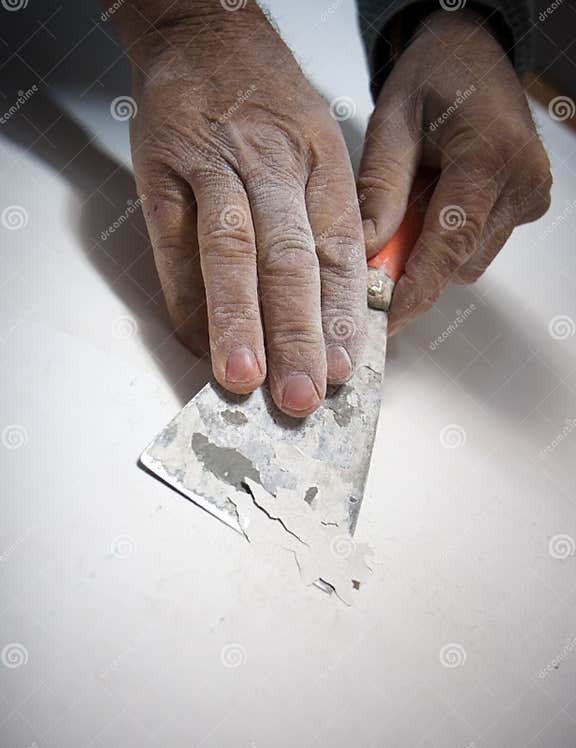 Hands scraping paint stock photo. Image of interior, work - 3998058