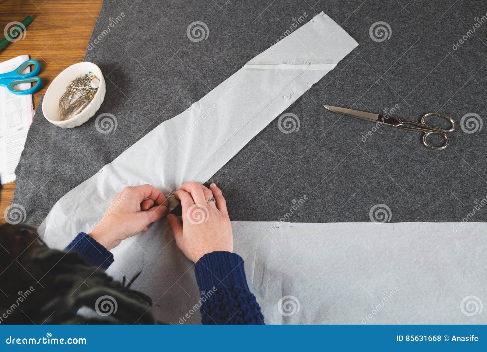 Hands of Seamstress Fixing Template To Fabric Stock Photo - Image of ...