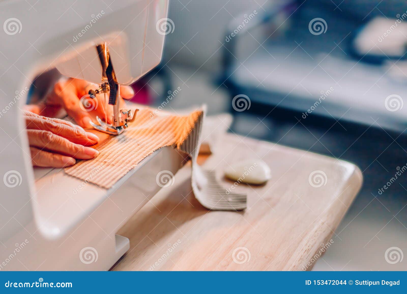 Hands of Sewing Process. Female Hands Stitching Fabric. Stock Photo ...