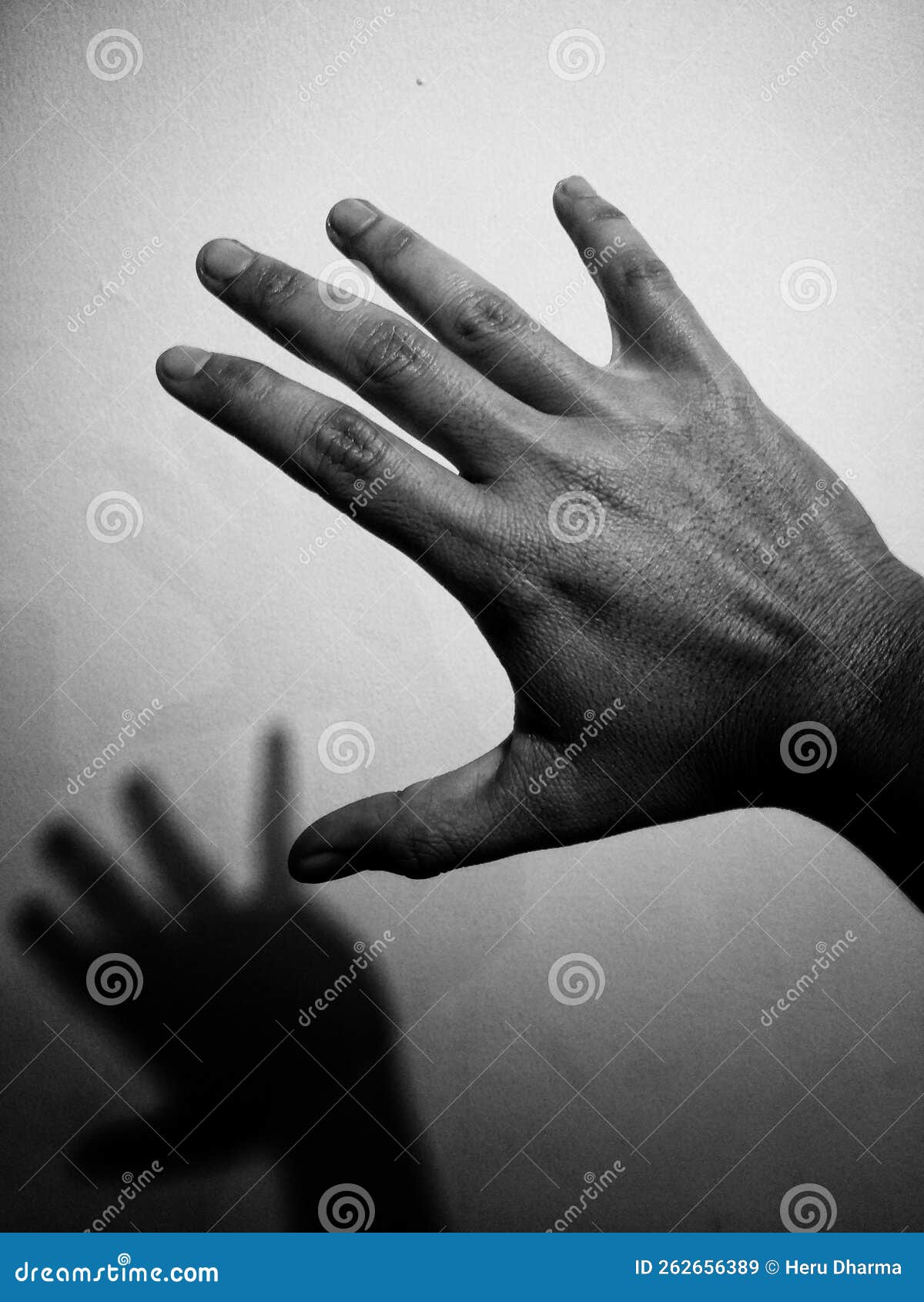 Hands, shadows and walls stock image. Image of person - 262656389