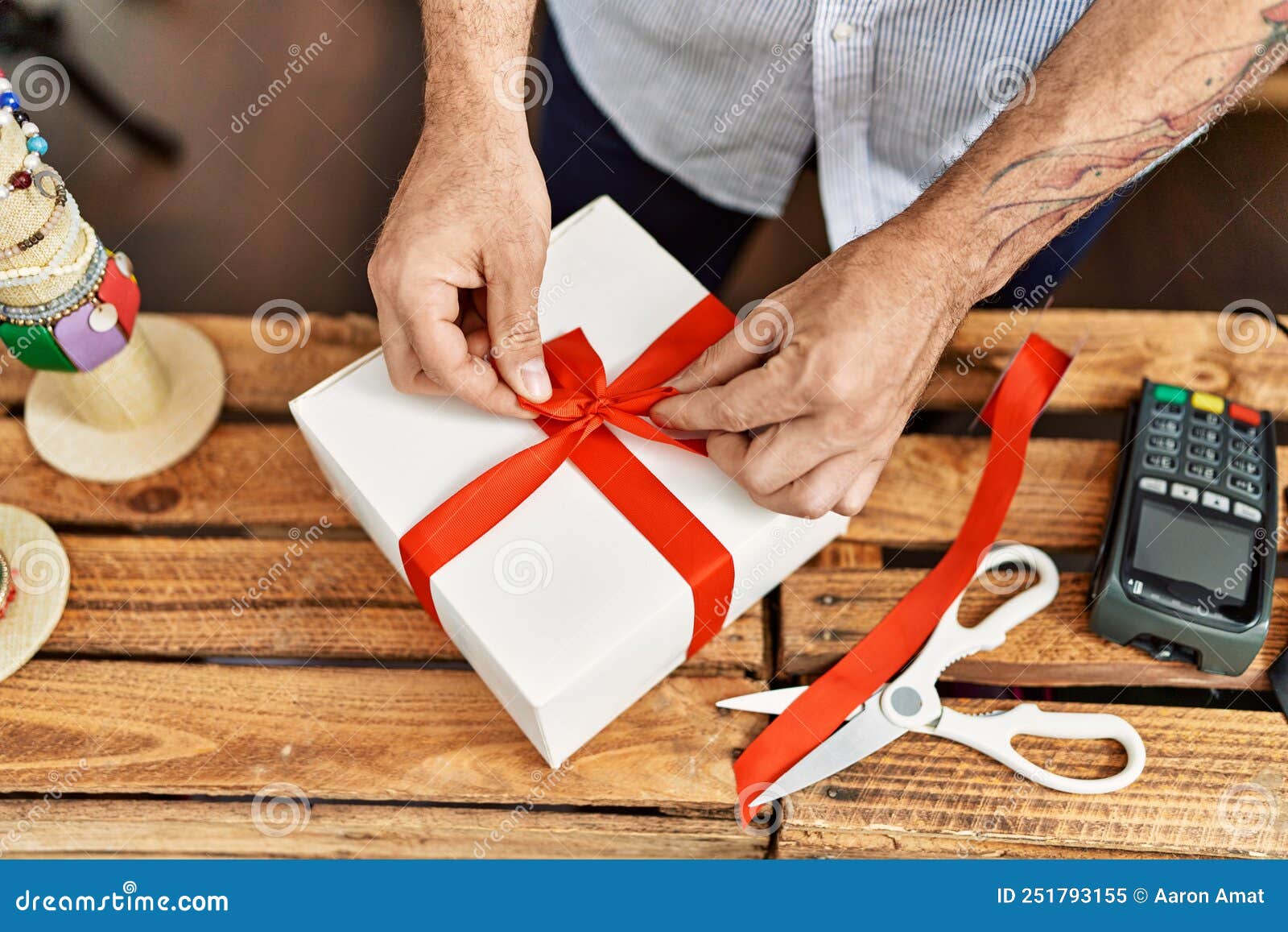 Hands of Shopkeeper Man Preparing Gift at Clothing Store Stock Image ...