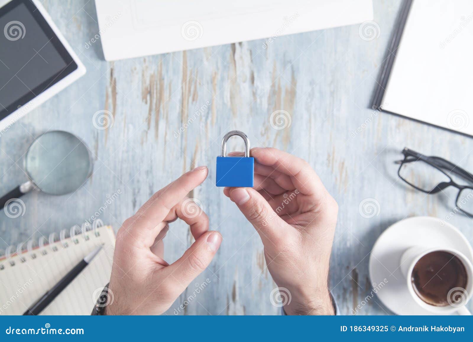 Hands Showing Padlock on the Business Desk. Technology. Business Stock ...
