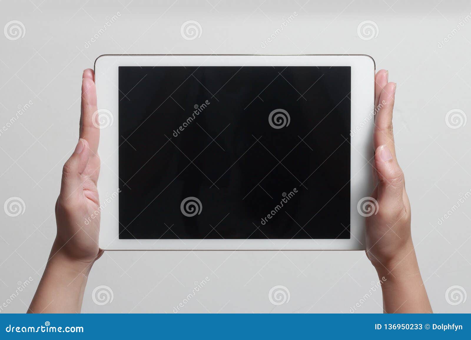 Hands showing tablet stock image. Image of technology - 136950233