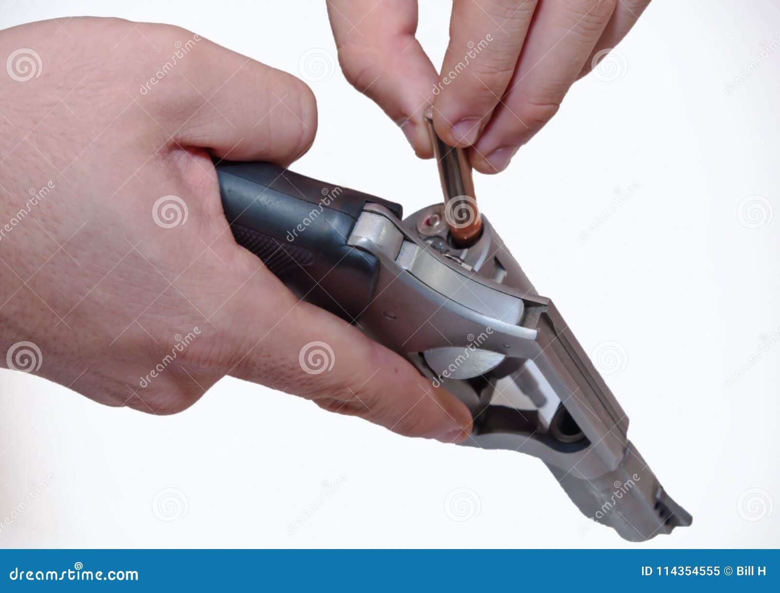 Hands Shown Loading a Revolver Stock Image - Image of magnum, handgun ...