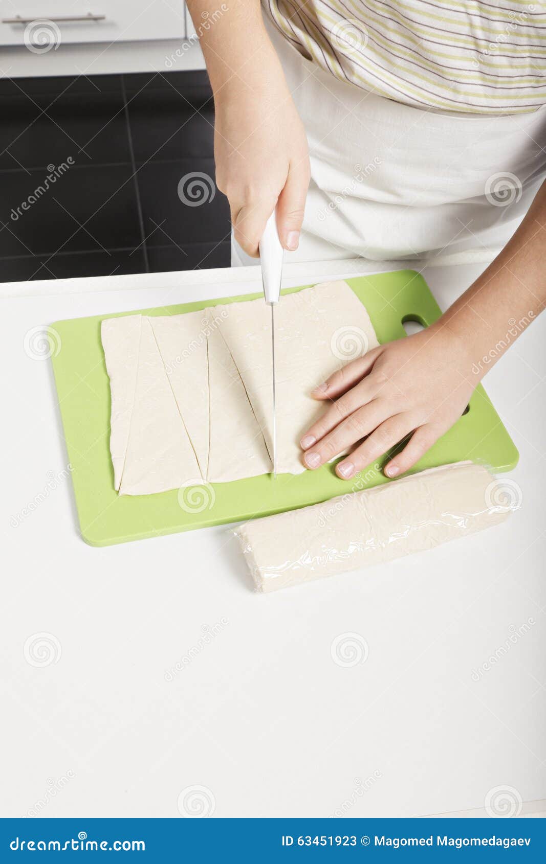 Hands slicing dough stock image. Image of kitchen, hands - 63451923