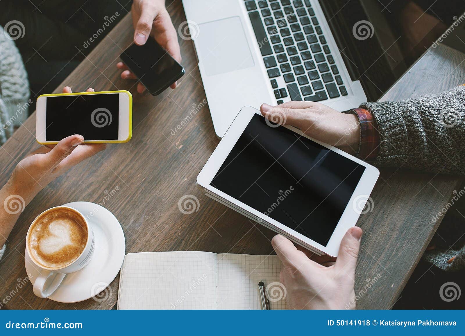 Hands with Smartphones, Tablet Over Table with Laptop and Coffee Stock ...