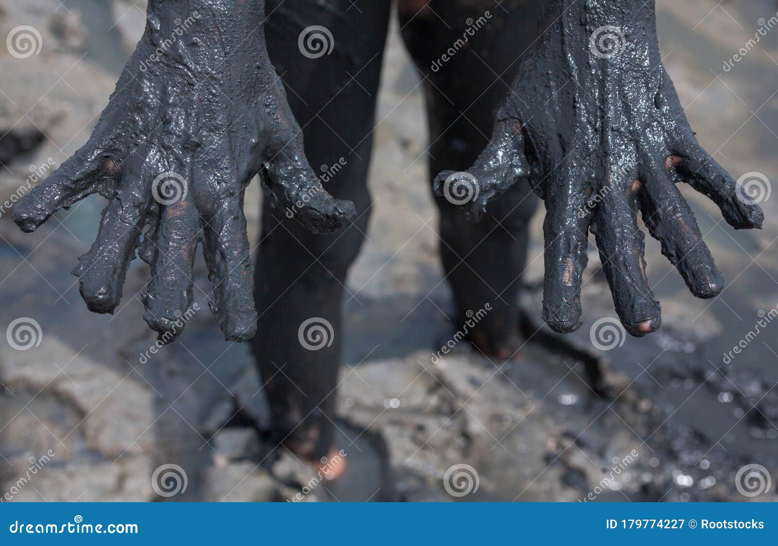 Hands Smeared with Black Healing Mud Stock Image - Image of natural ...