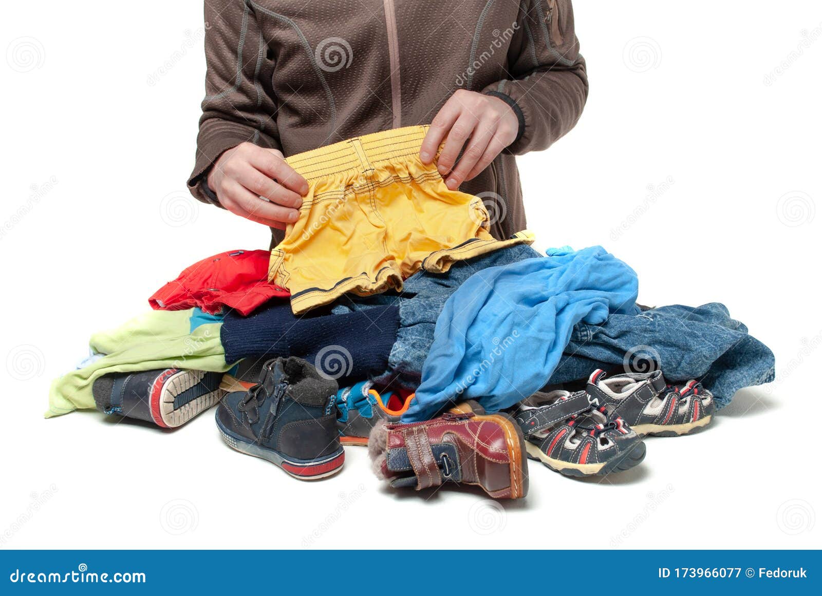 Hands are Sorting Out Shoes and Clothes from Second Hand Stock Image ...