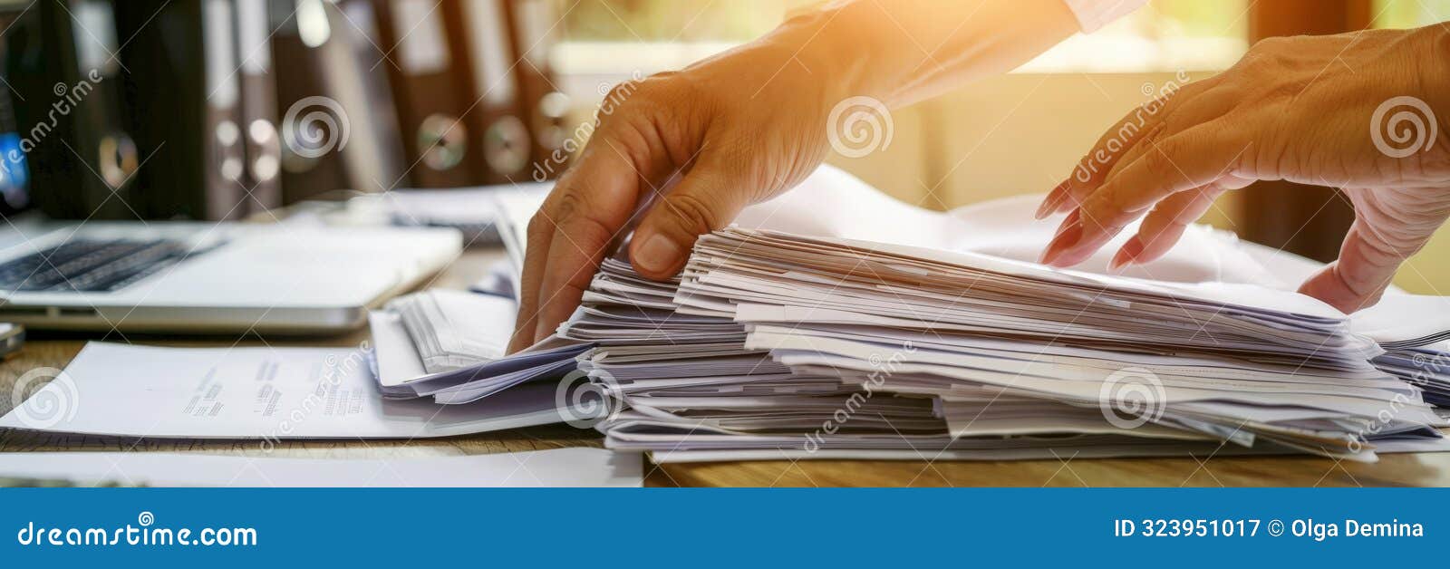 Hands Sorting through a Stack of Documents on a Desk. Business ...