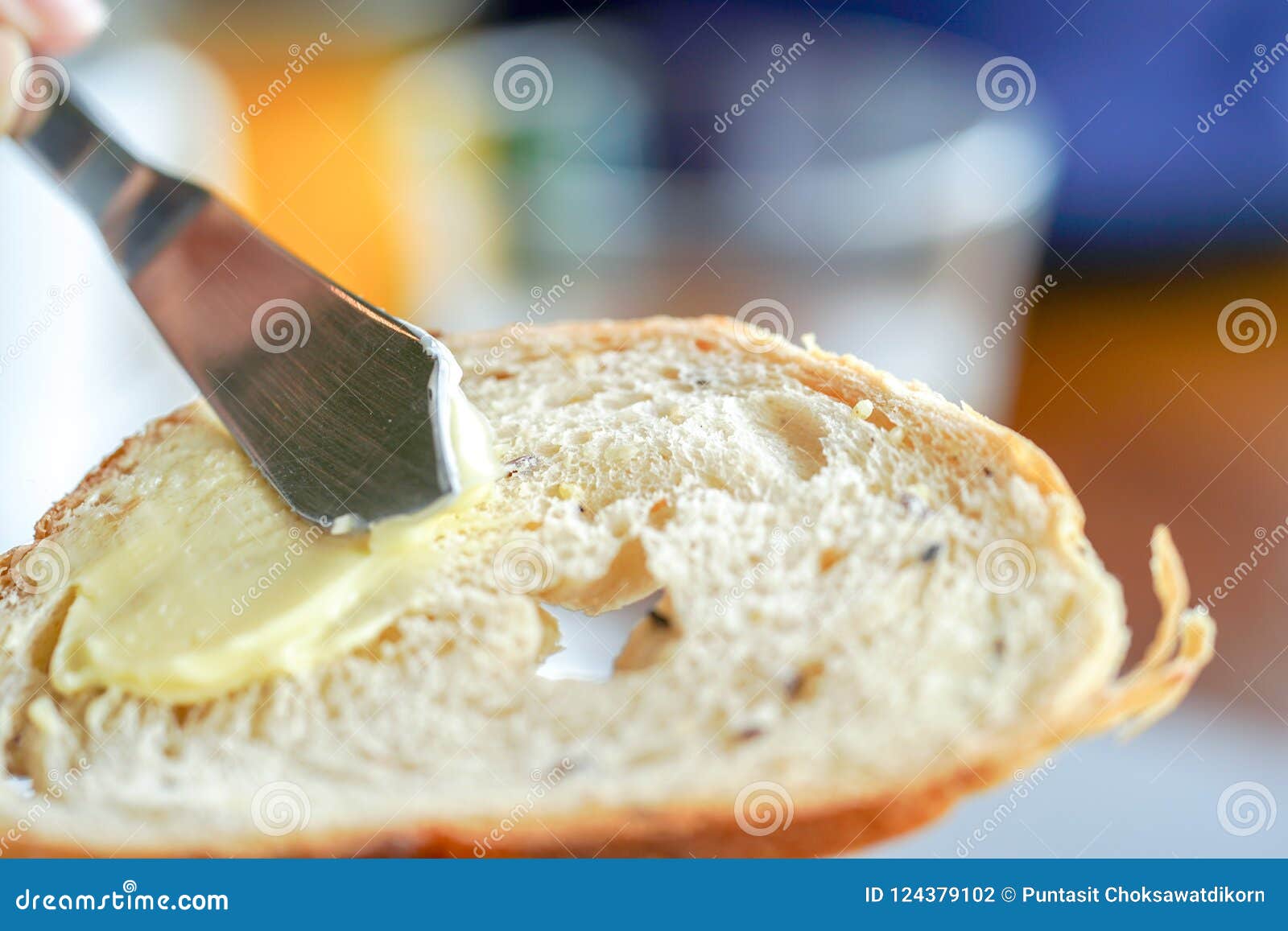 Hands Spreading Butter on Bread Stock Photo - Image of hand, kitchen ...
