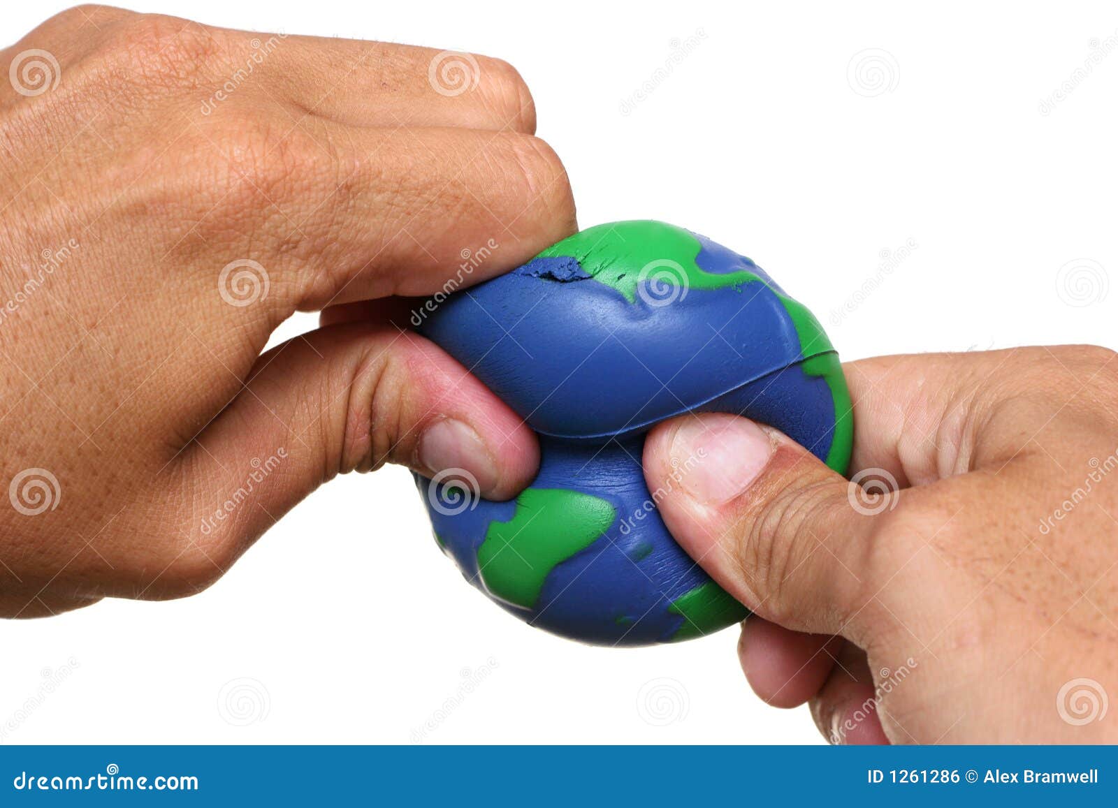 Hand Squeezing The World Stock Photo | CartoonDealer.com #20845044