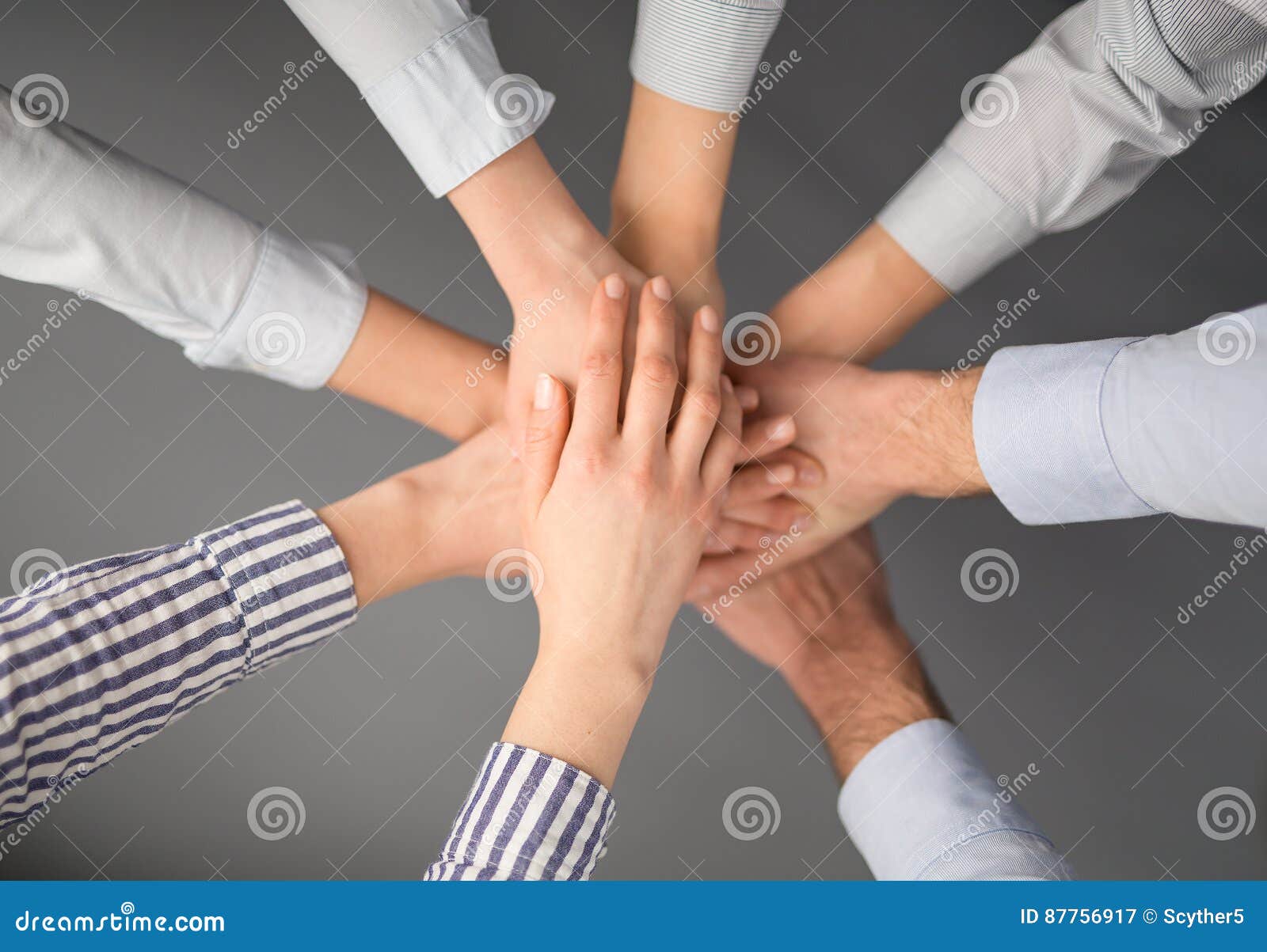 Hands Stacked in a Pile. a Symbol of Teamwork and Trust Stock Image ...