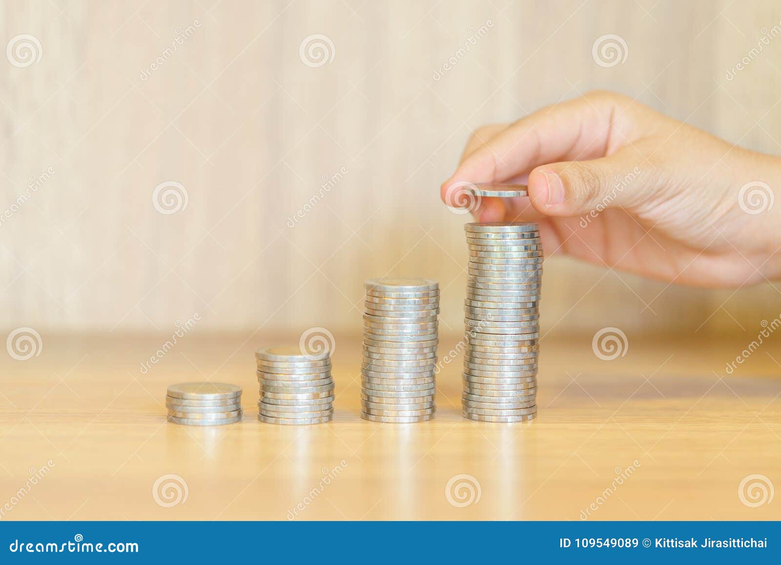 Hands Stacking Money for Growing Chart of Coins. Stock Image - Image of ...