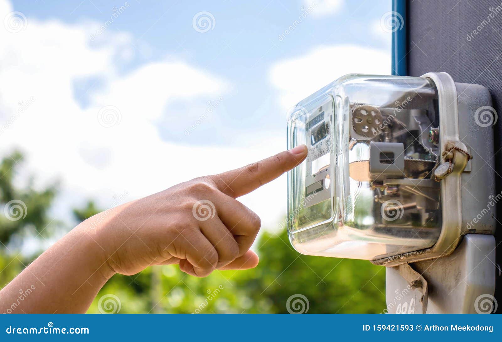 The Hands of Staff are Checking the Electricity Meter Stock Image ...