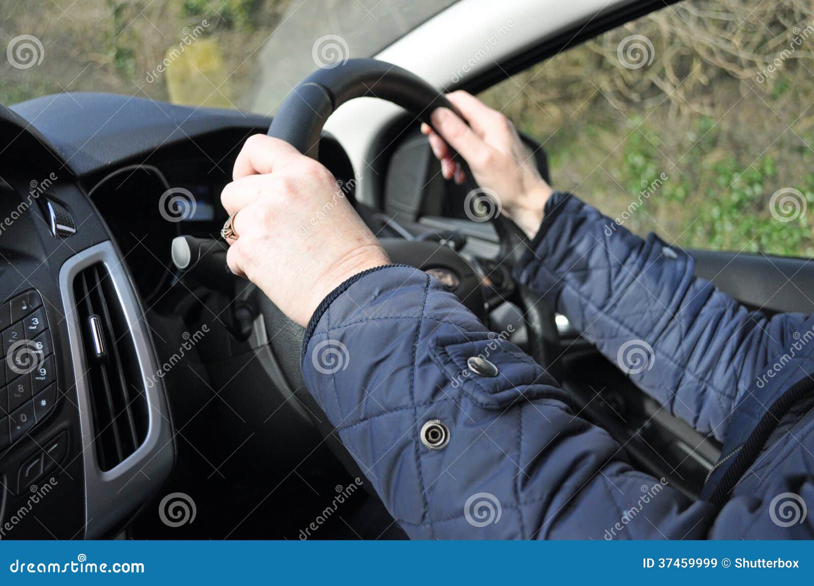 Hands on Steering Wheel of a Car Stock Image - Image of navigating ...