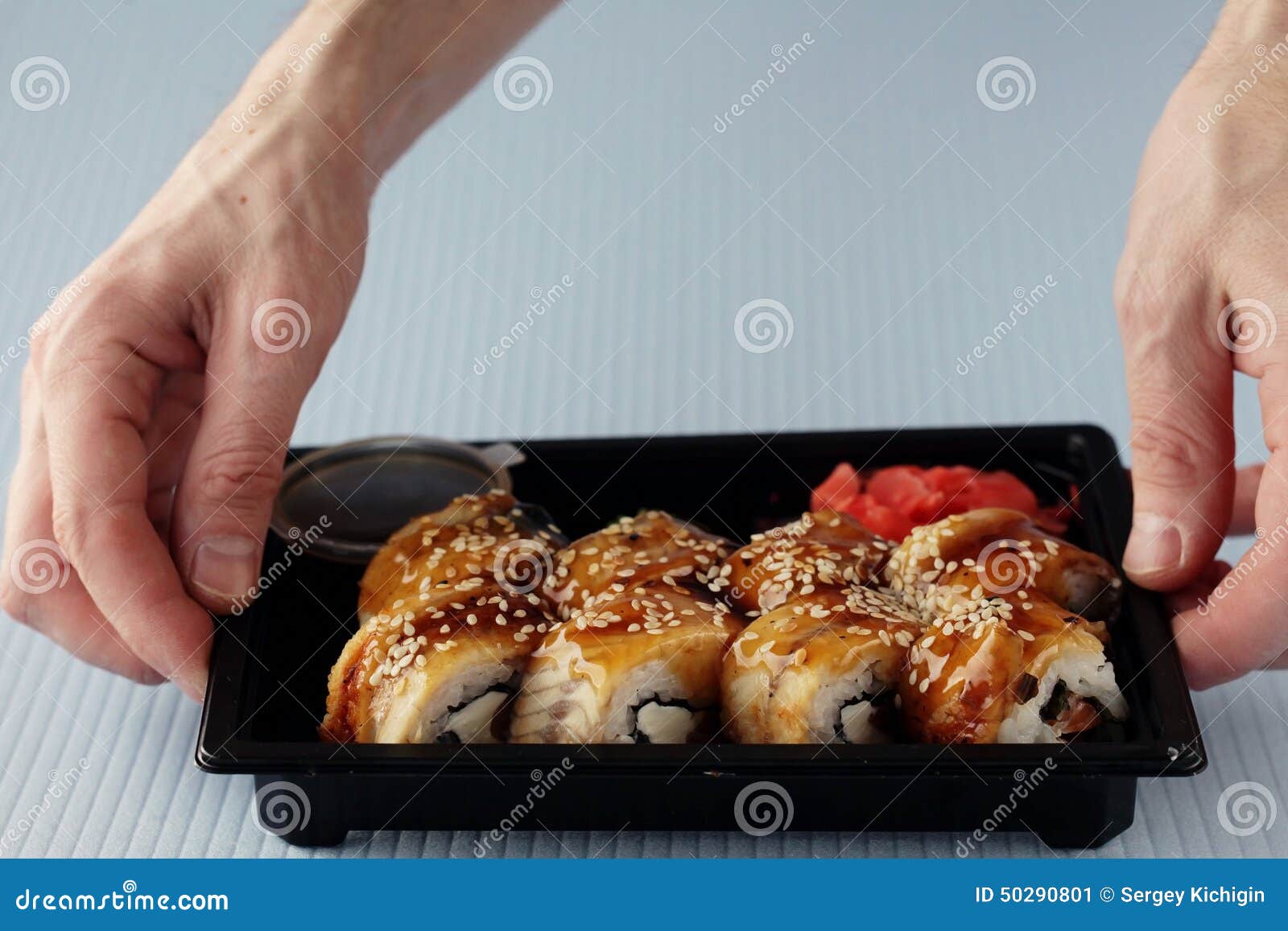 Hands sticks japan rolls stock image. Image of hands - 50290801