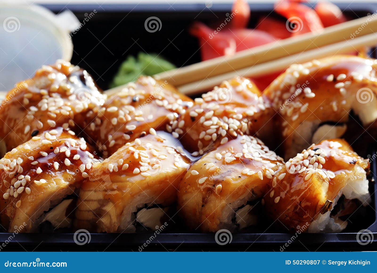 Hands sticks japan rolls stock image. Image of delicious - 50290807