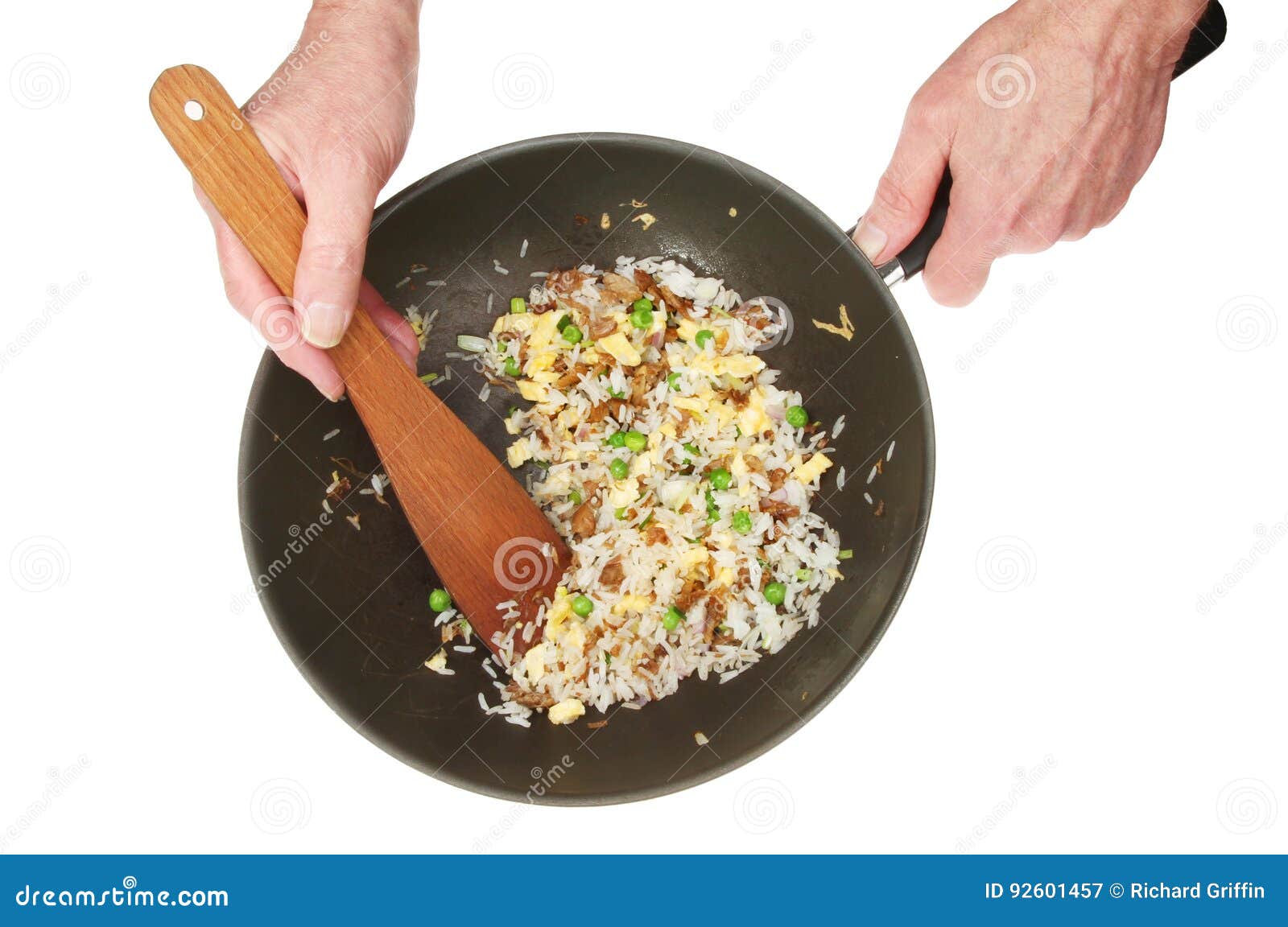 Hands stirring fried rice stock image. Image of isolated - 92601457