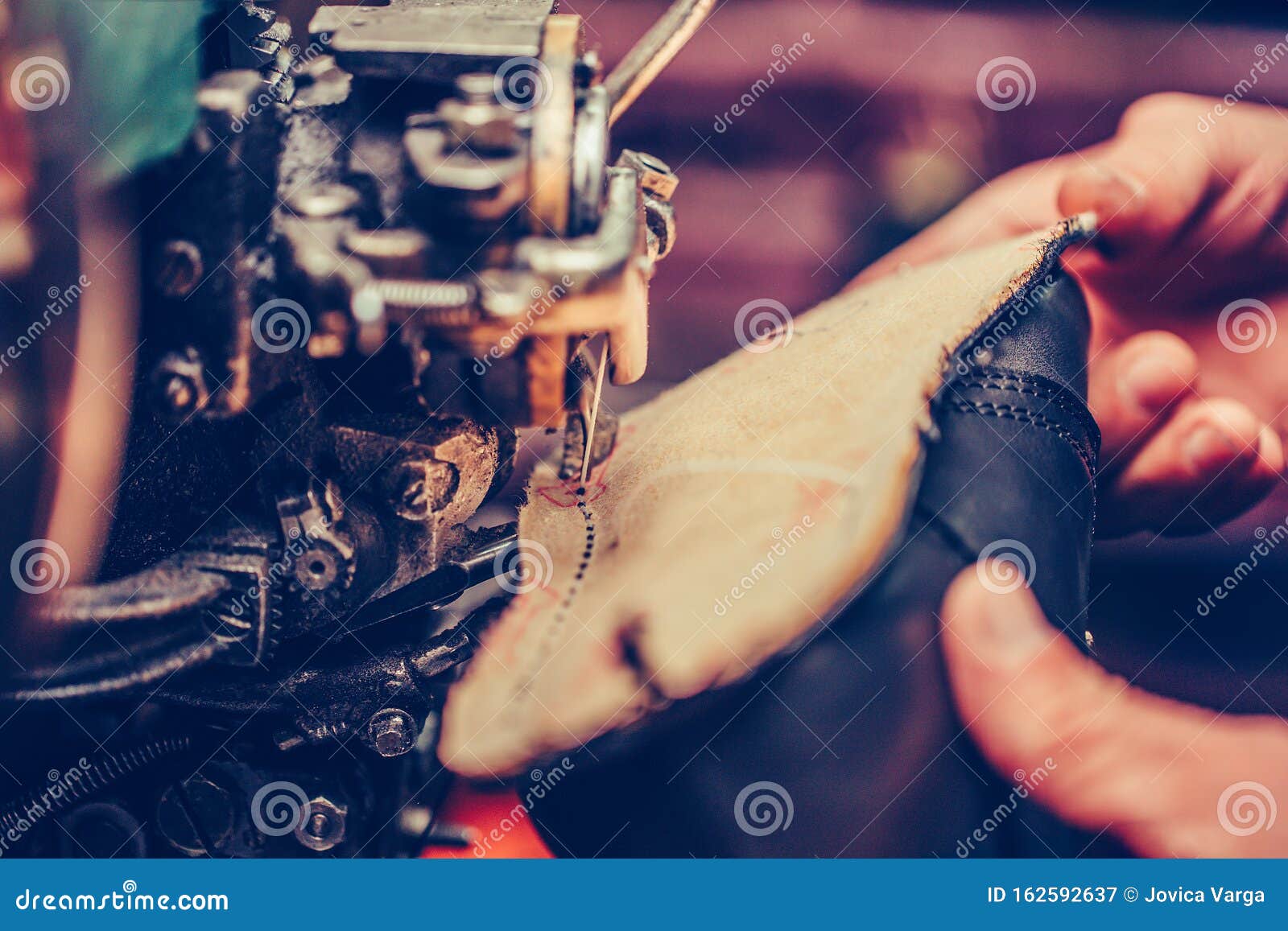 Hands Stitching a Part of the Shoe in a Shoe Factory Stock Image ...
