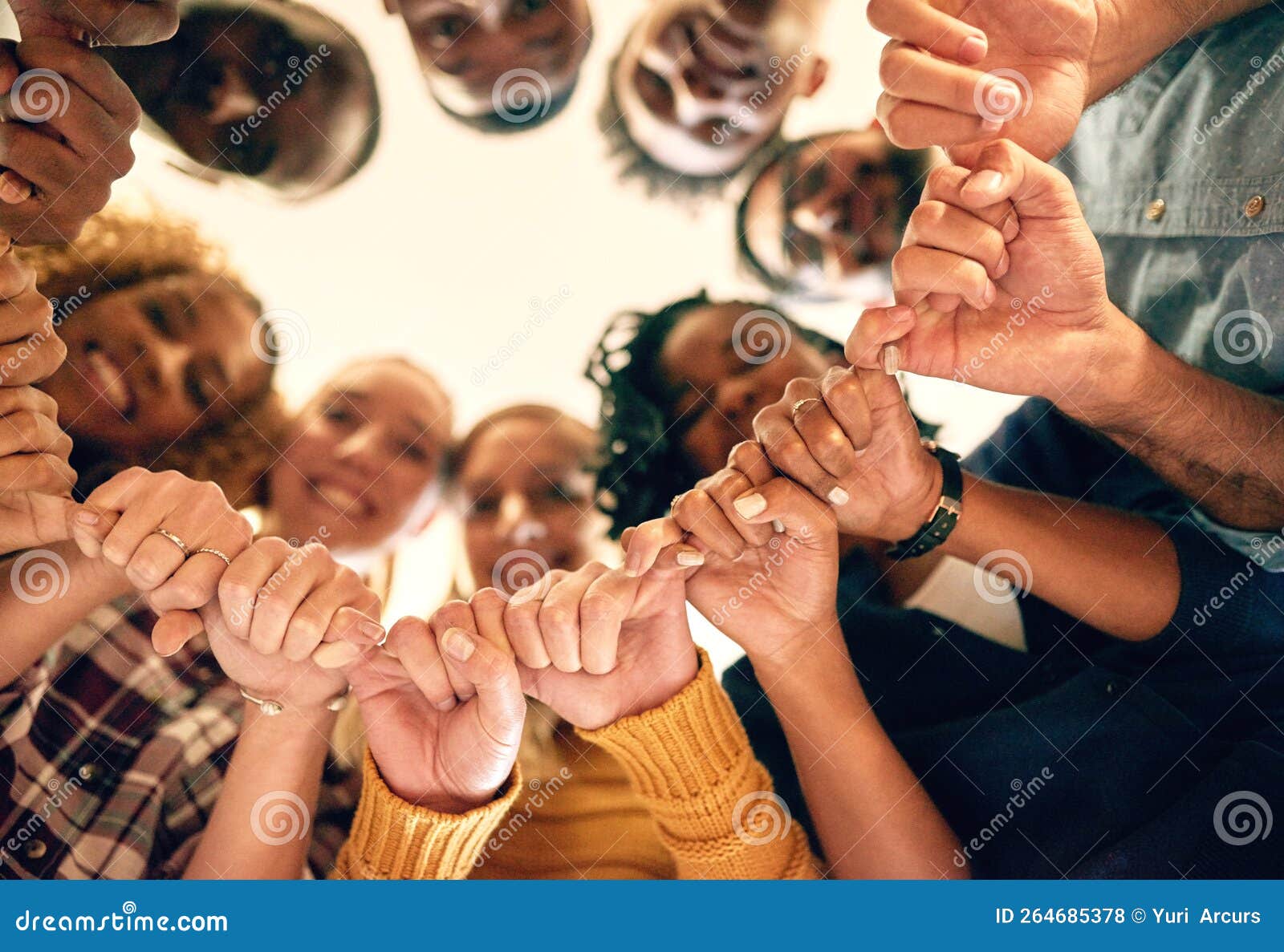 Hands of Strength and Support. Low Angle Shot of a Group of People ...