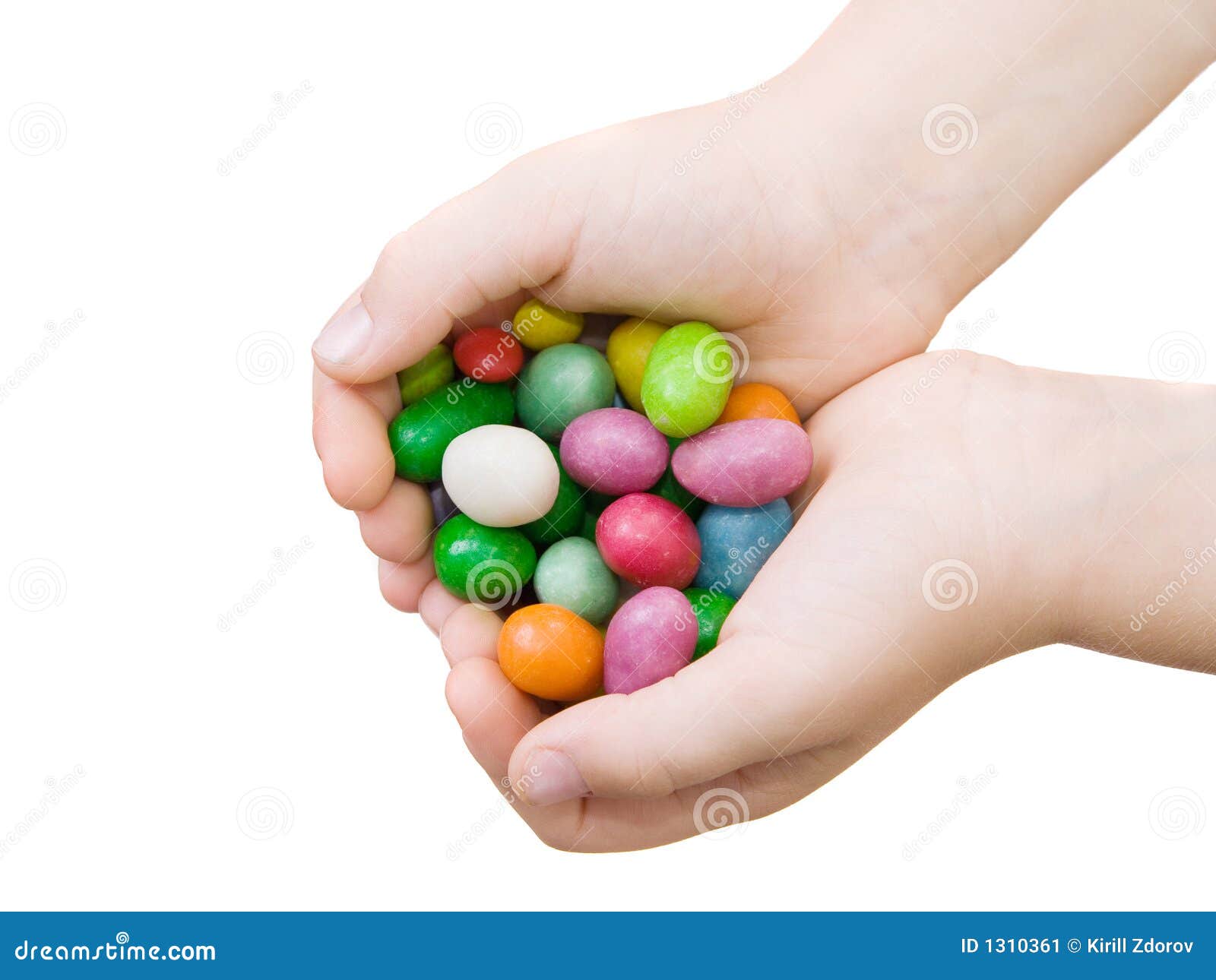 Hands with sweets stock image. Image of caramel, green - 1310361