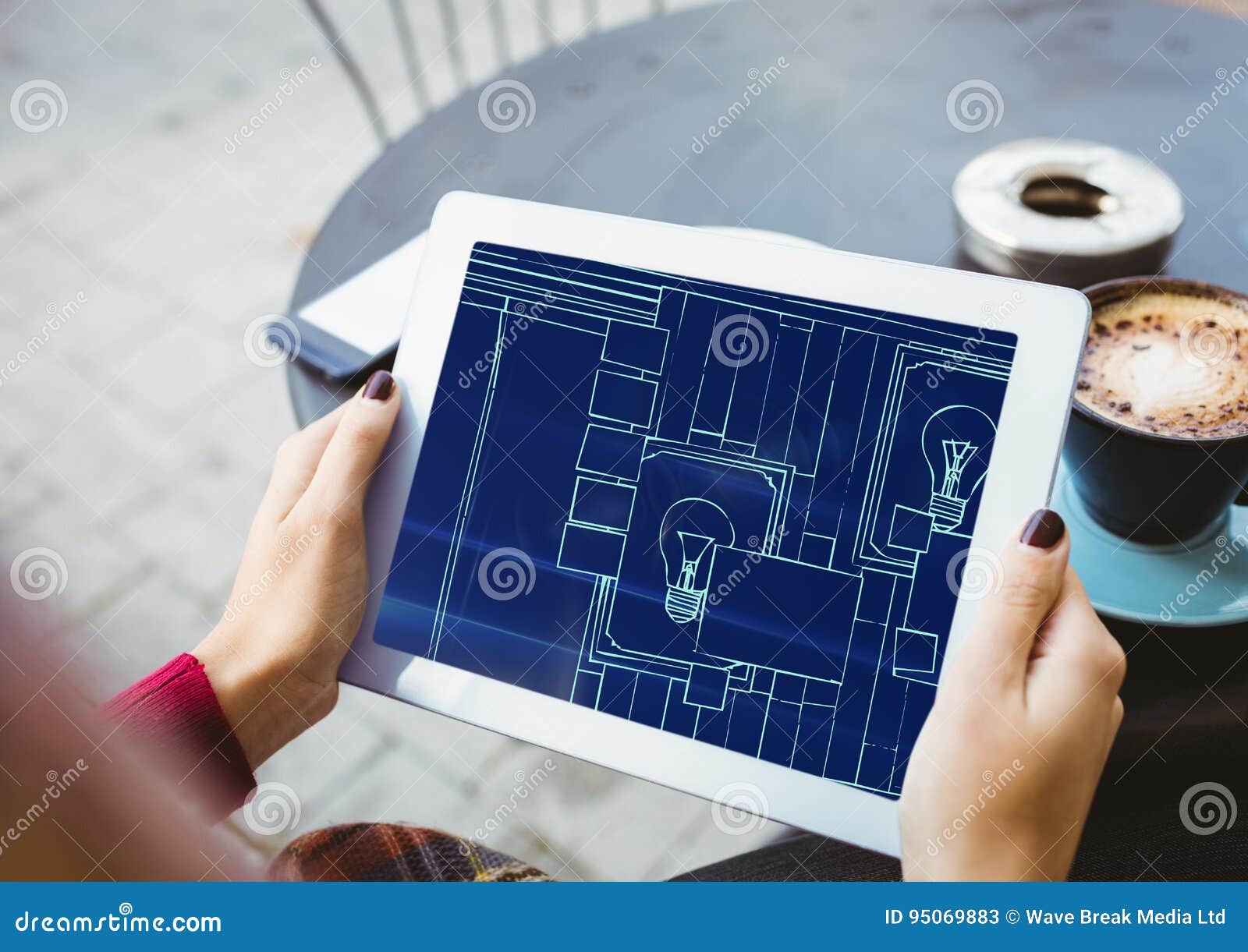 Hands with Tablet with Blueprint on it (two-tone: Dark Blue and Light ...