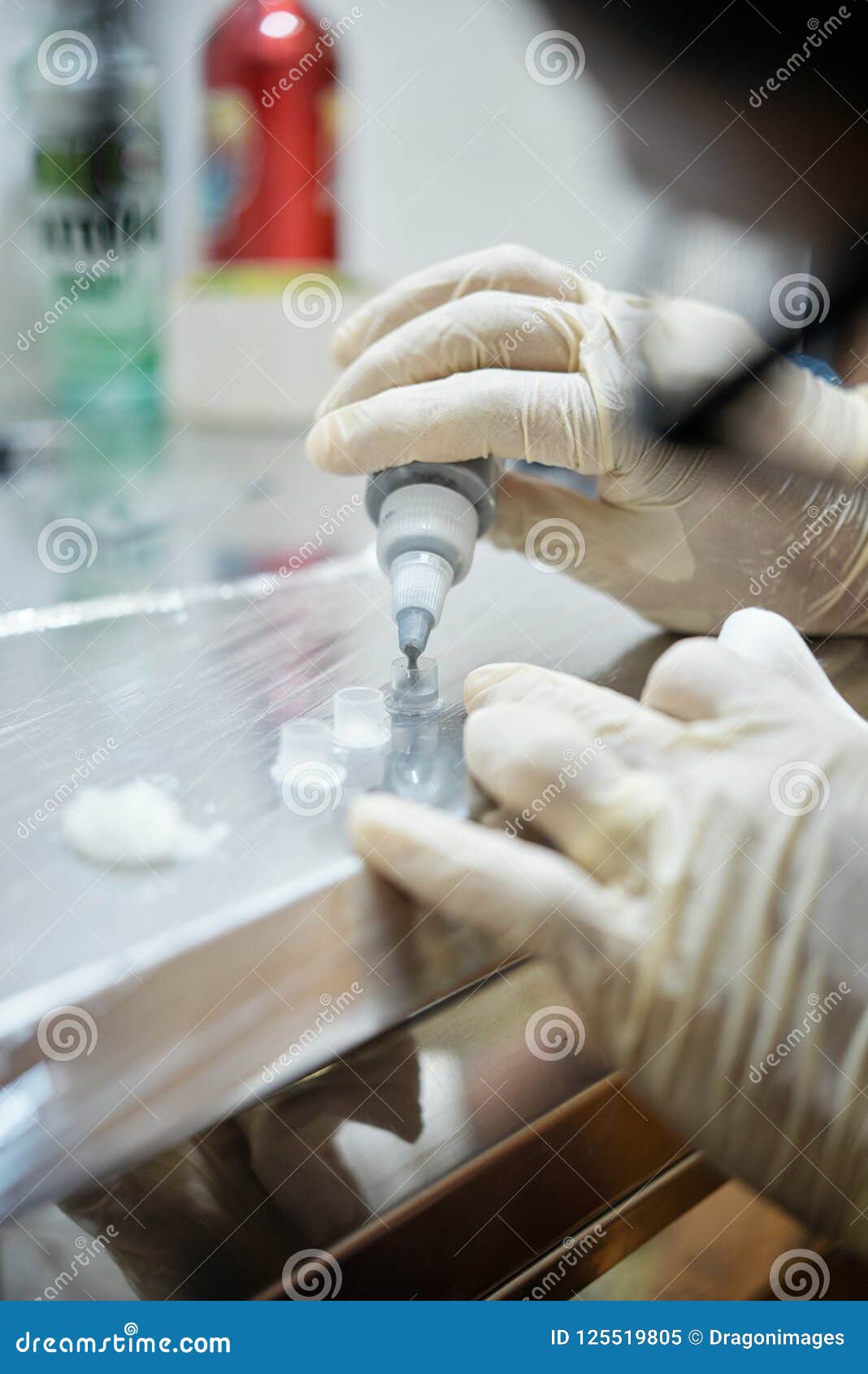 Tattoo Master Preparing Ink Stock Image - Image of tattooing, pouring ...