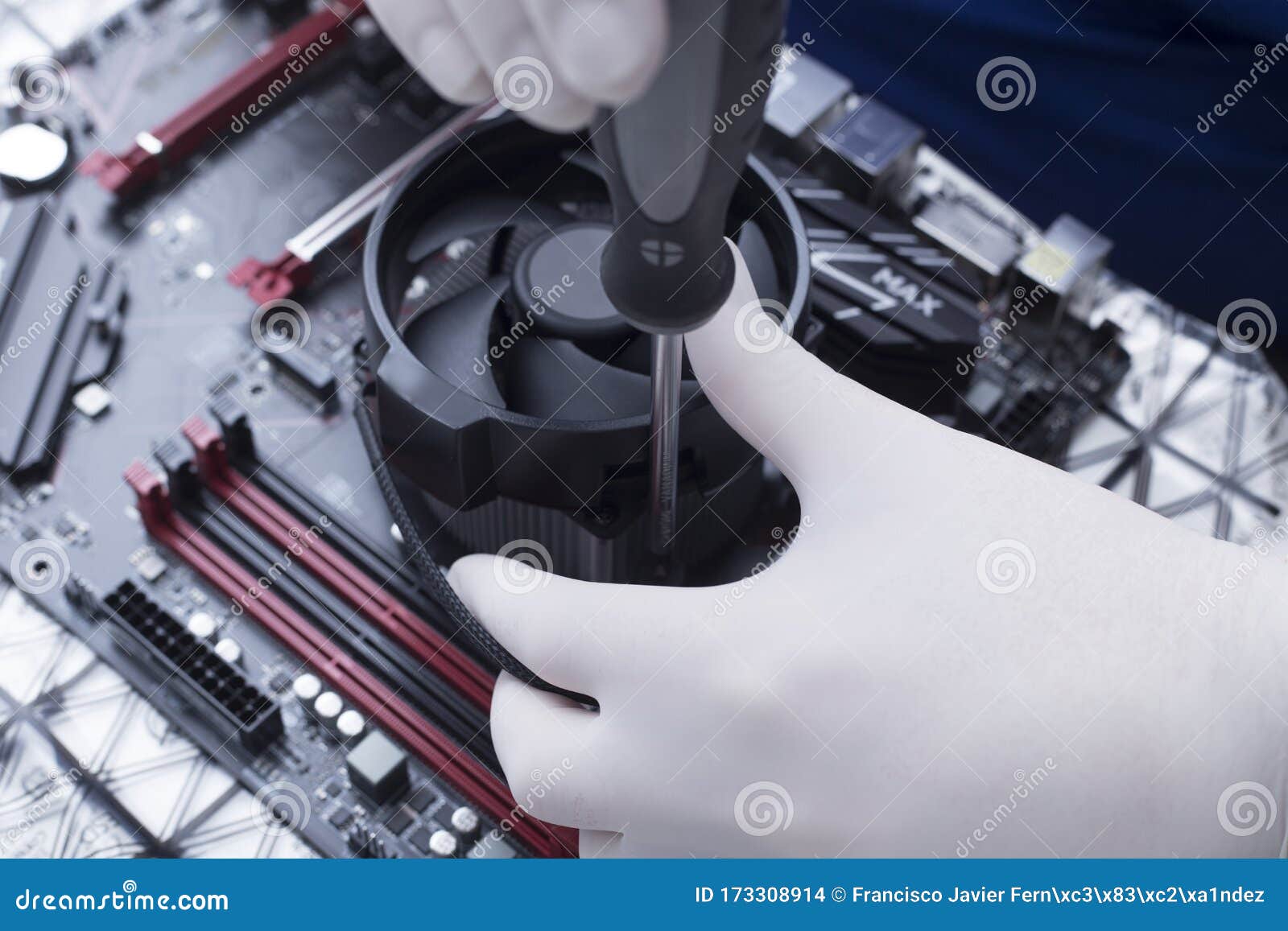 Hands Of A Technician Assembling Computer Hardware Parts New Cpu Is Being Mounted Unto The