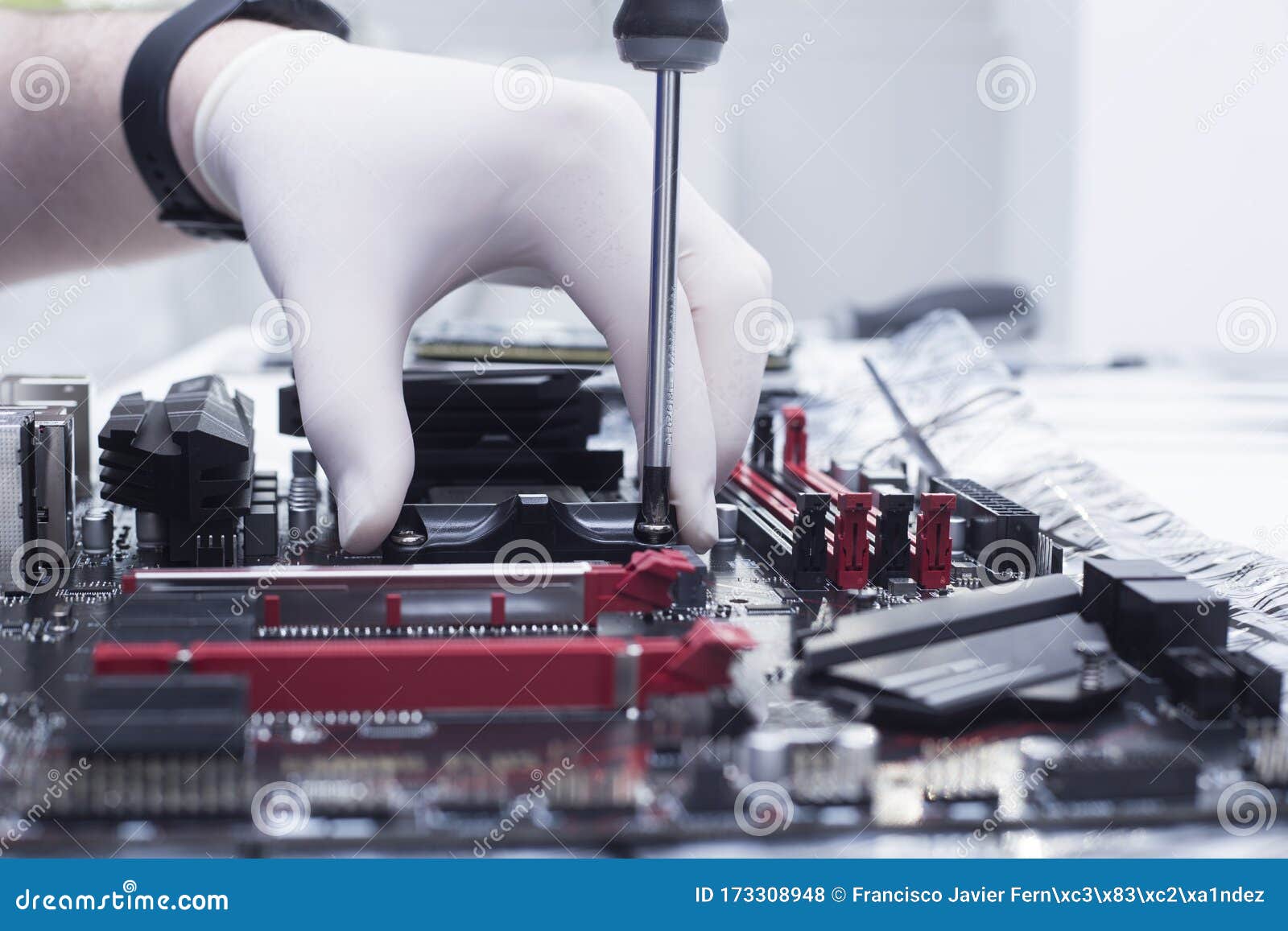 Hands Of A Technician Assembling Computer Hardware Parts New Cpu Is Being Mounted Unto The