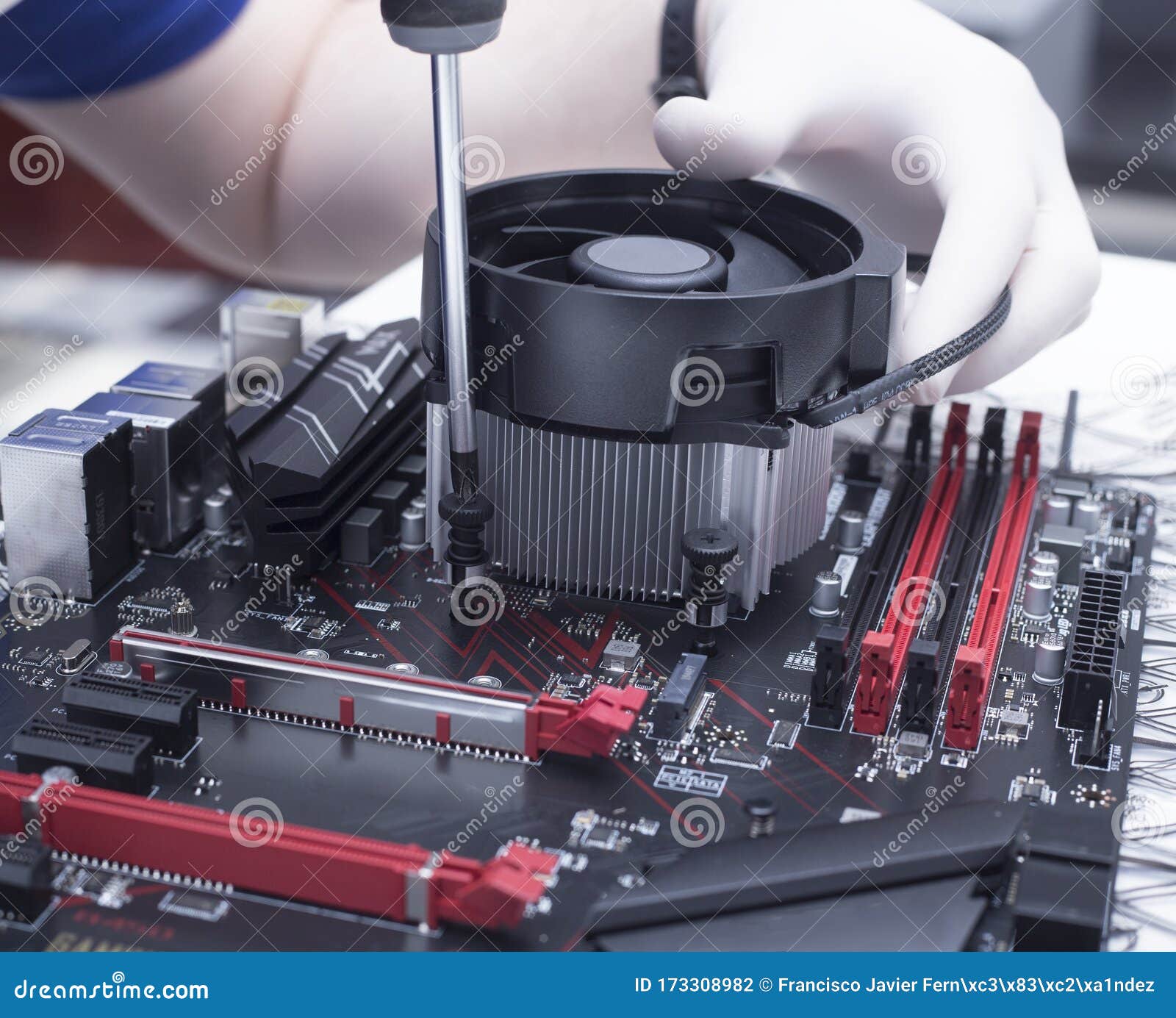 Hands Of A Technician Assembling Computer Hardware Parts New Cpu Is Being Mounted Unto The