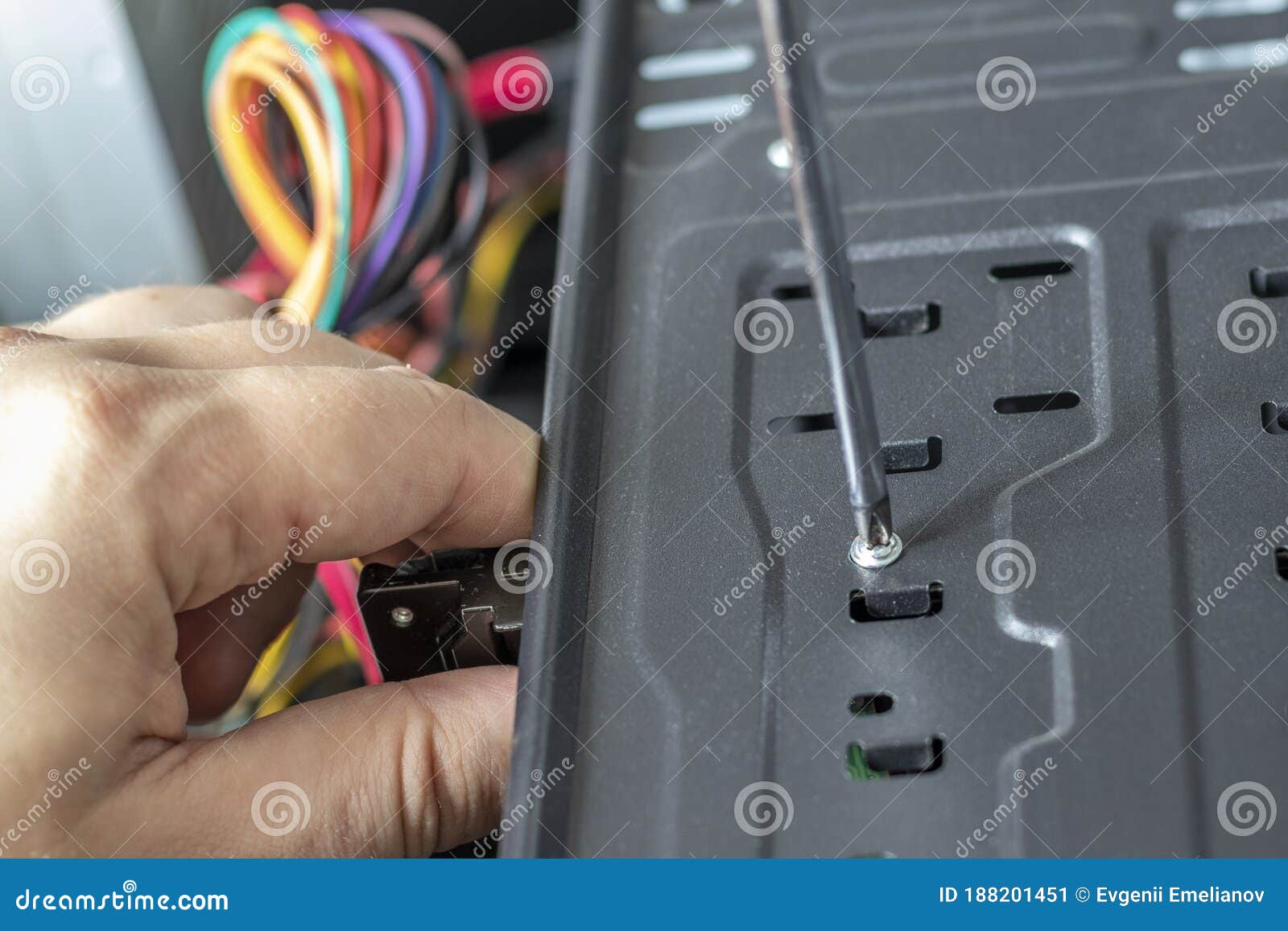 Hands of the Technician Repairing a Computer. Hardware Instalation ...