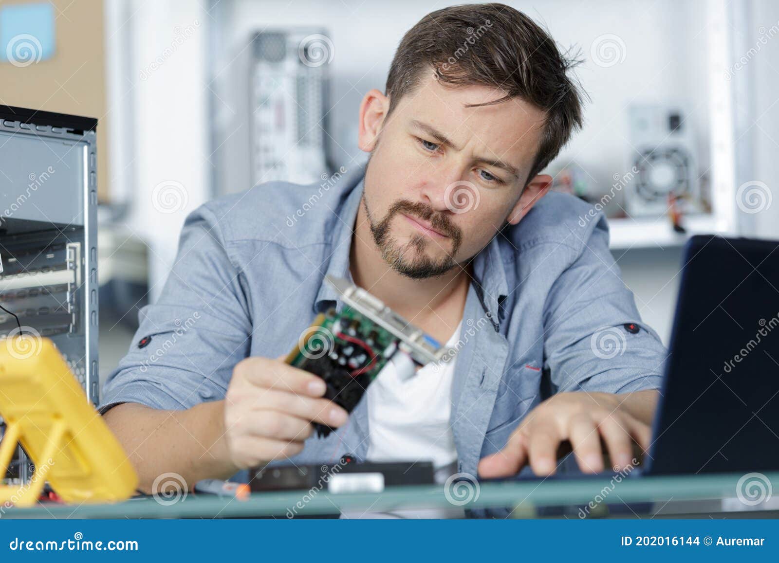 CPU In Hands Of A Technician. The Processor Is Being Examined For ...