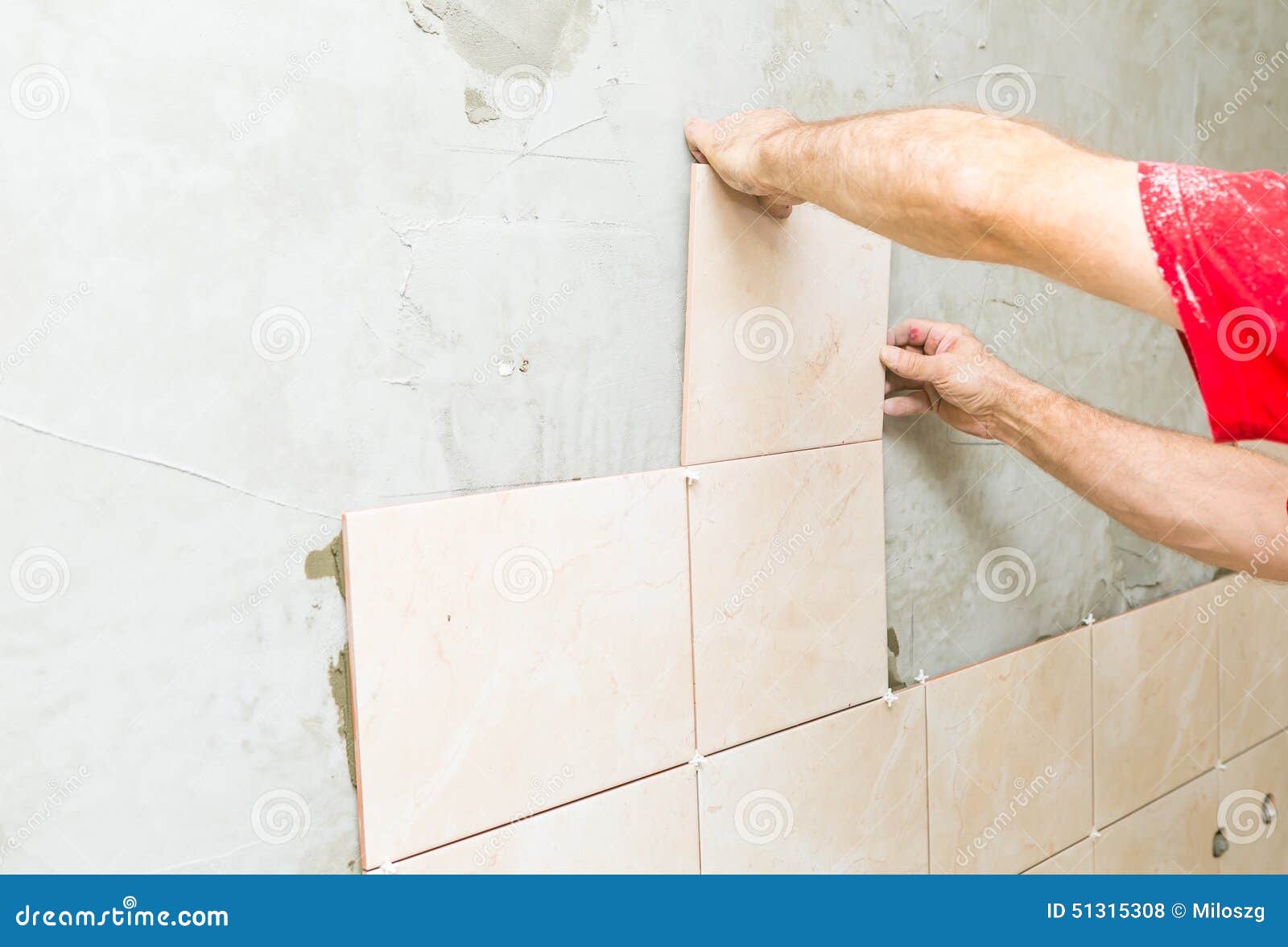 Hands and tiles stock photo. Image of mason, indoor, installing - 51315308