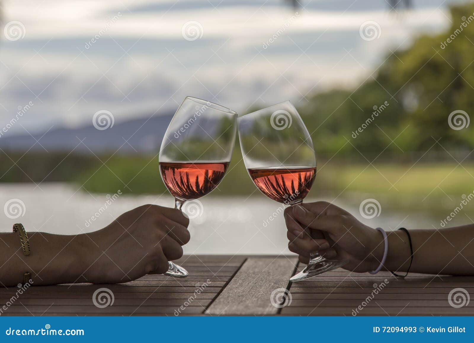 Hands toasting wine stock image. Image of relationship - 72094993