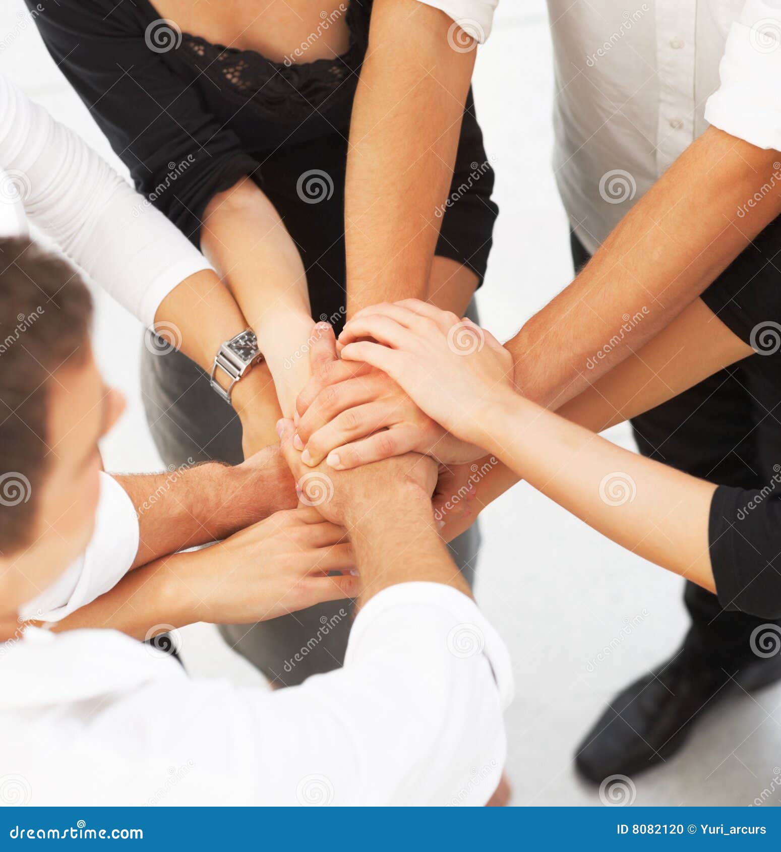 Hands on top of each other stock photo. Image of businesswoman - 8082120