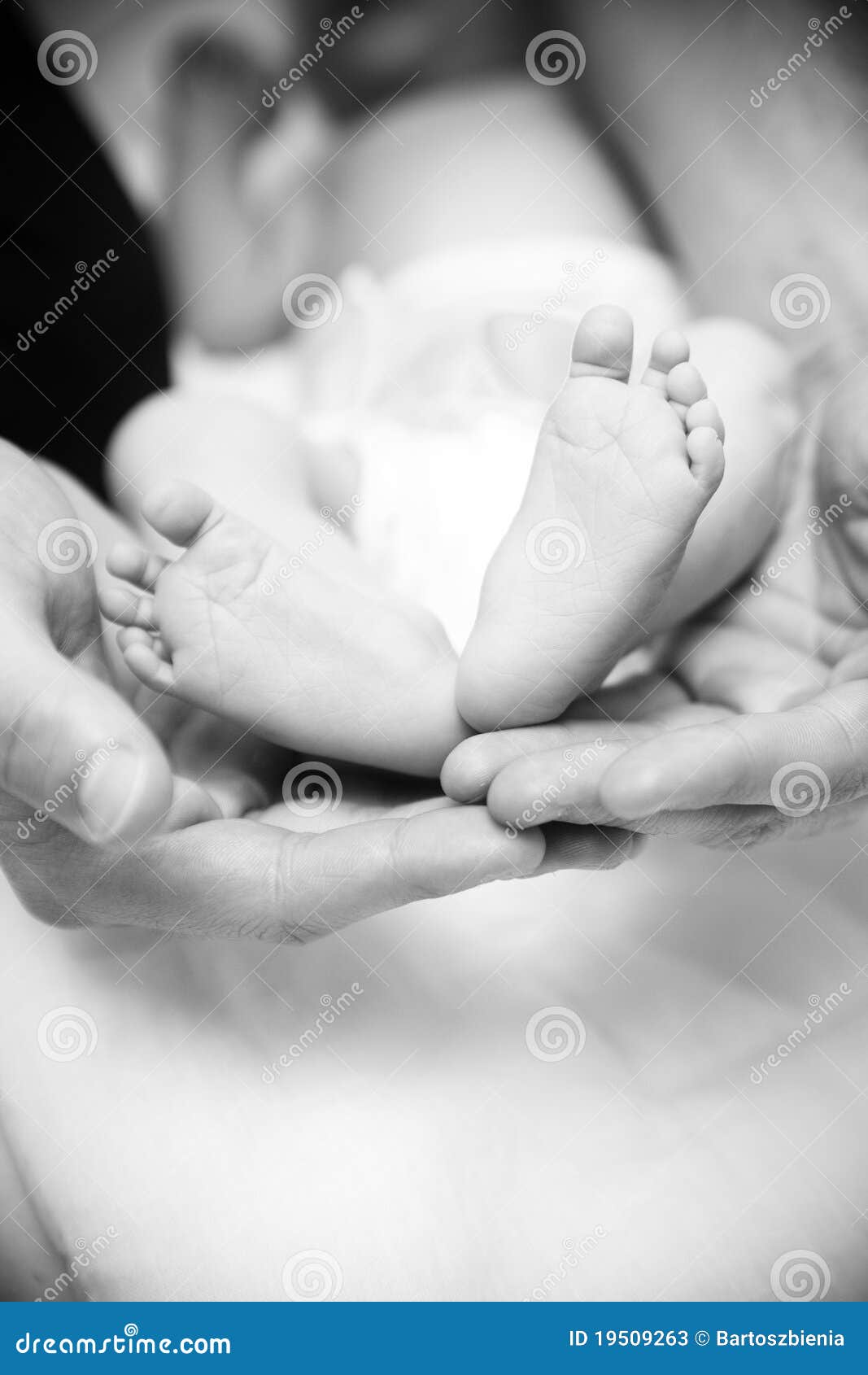 Hands touch child s feet stock image. Image of feeding - 19509263