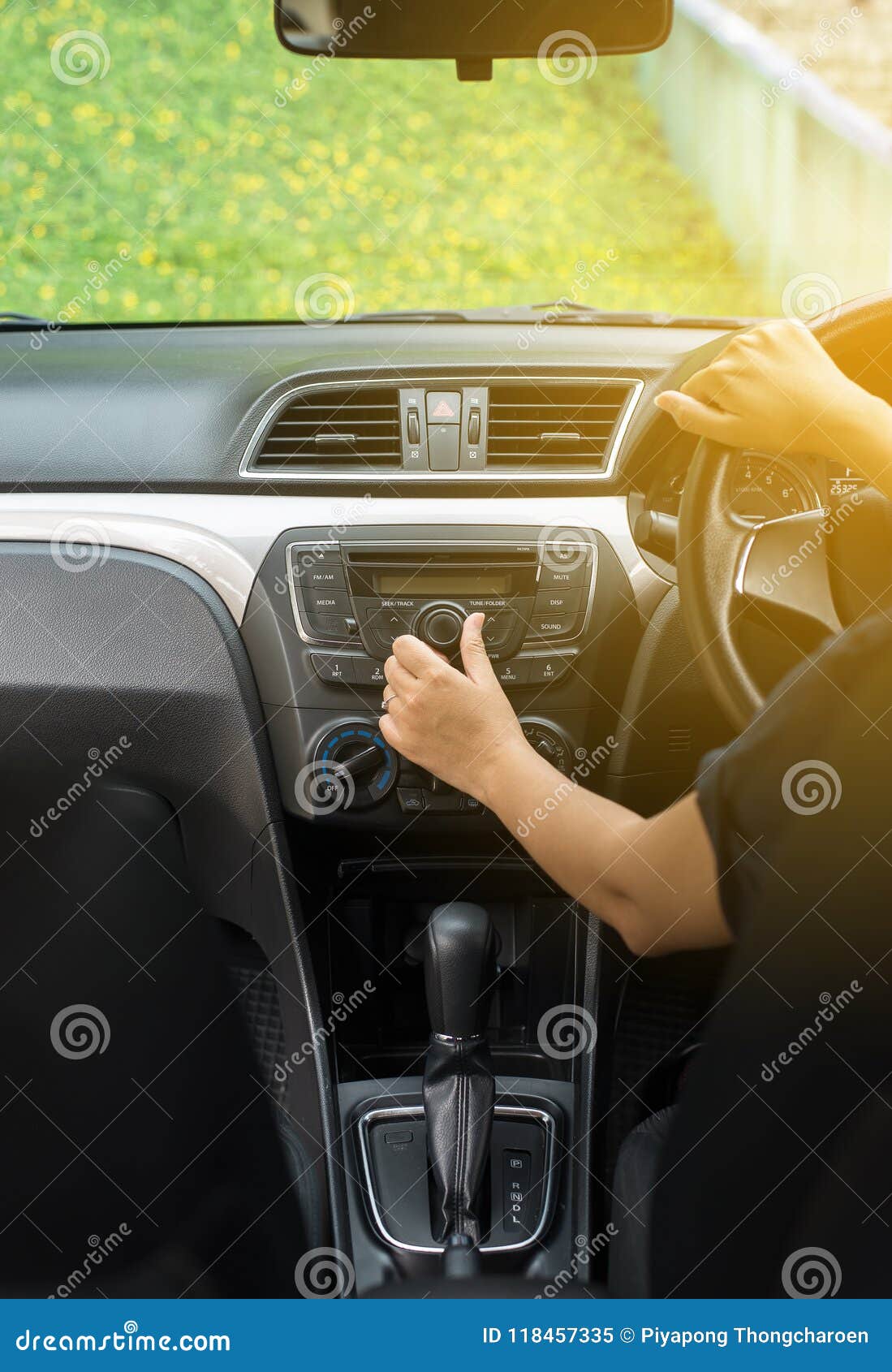 Hands Touching the Screen and Turning on Car Radio System,Button on ...