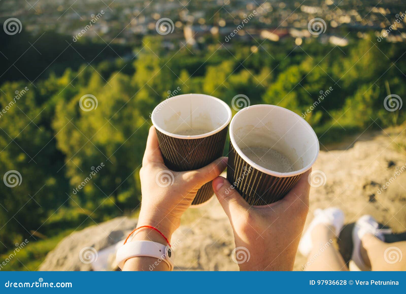 Hands with Two Cups of Coffee Stock Photo - Image of lviv, hold: 97936628