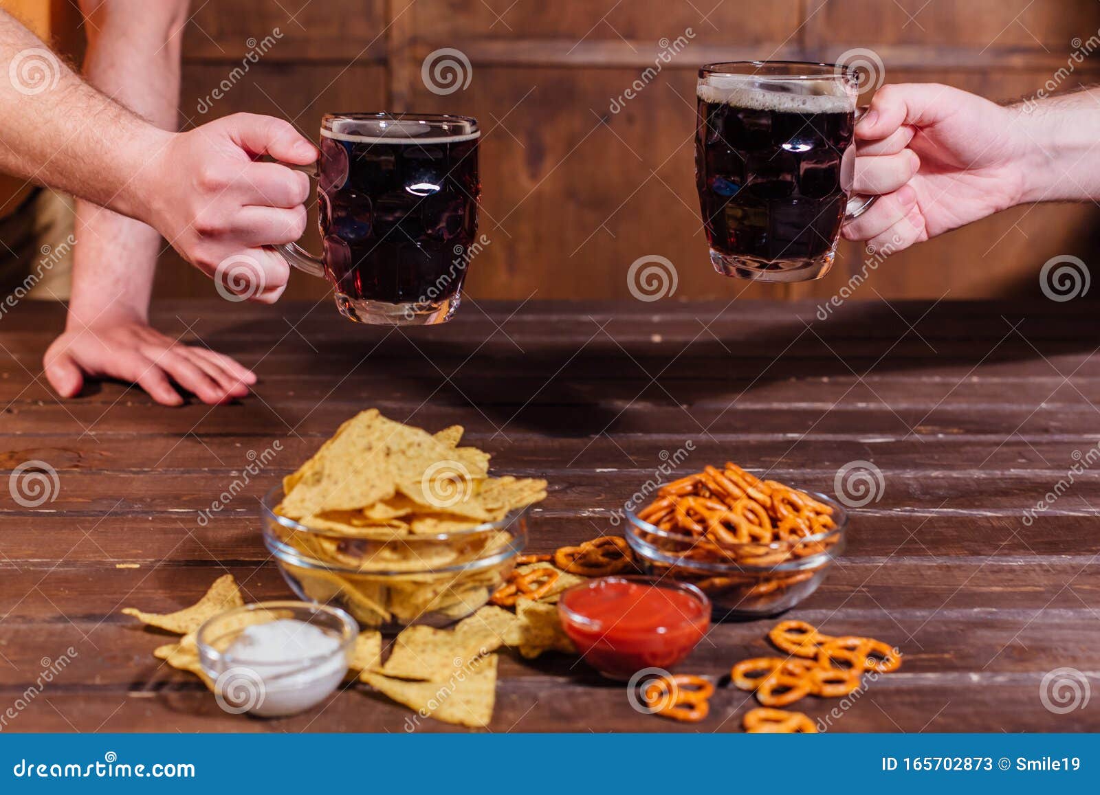 Hands of Two Men Holding Beer Glasses Drinking Beer Together Stock ...