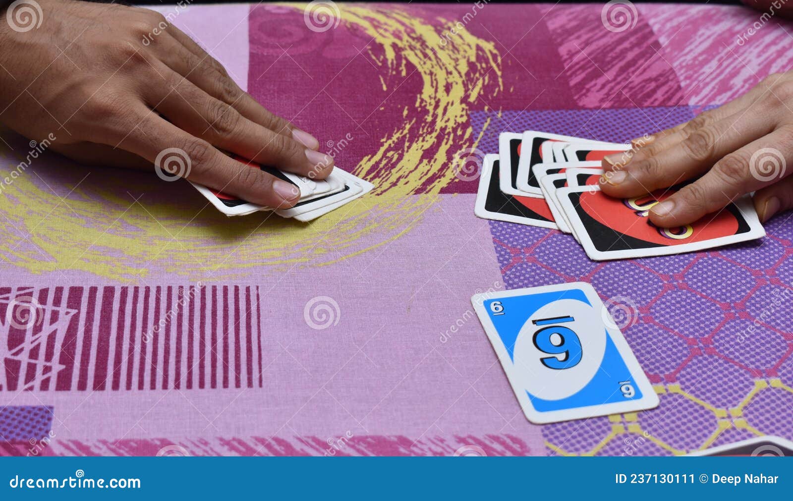 Hands of Two People Playing Uno Card ,American Card Editorial Photo ...